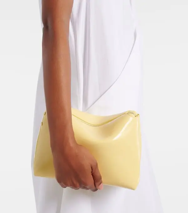 Khaite Lina Leather Crossbody Bag In Yellow 30% Off Editorialist