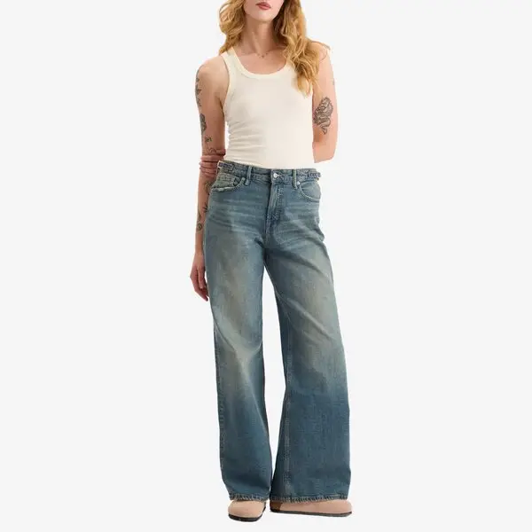 Good American Good Ease Adjustable Tab Baggy Jeans
