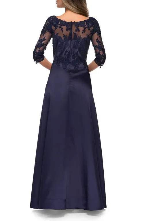 La Femme Three Quarter Sleeve Lace Gown