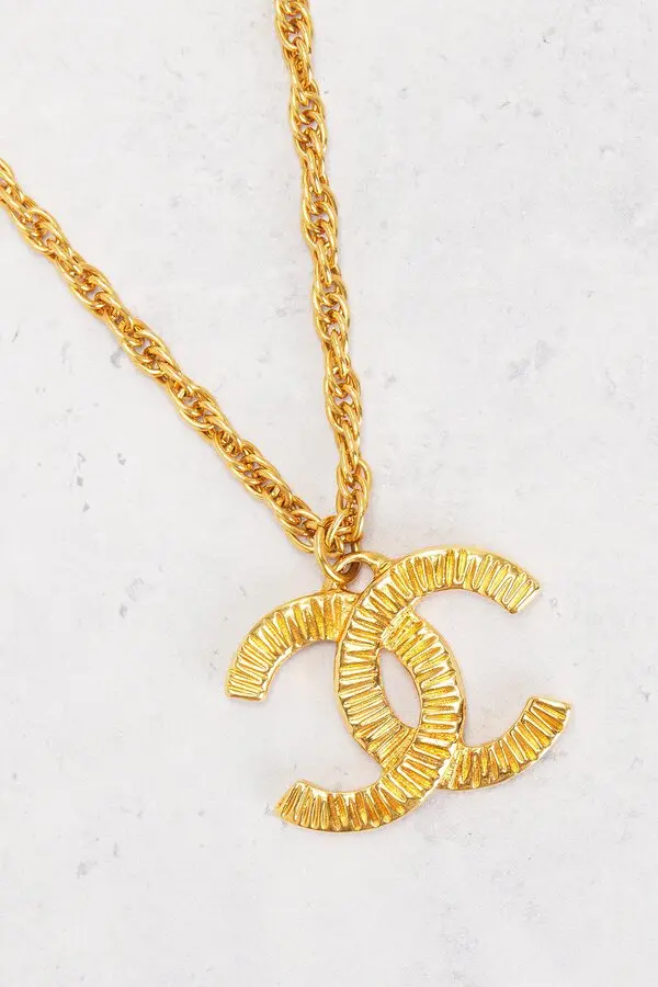 Chanel 1993 Coco Mark Necklace In Metallic