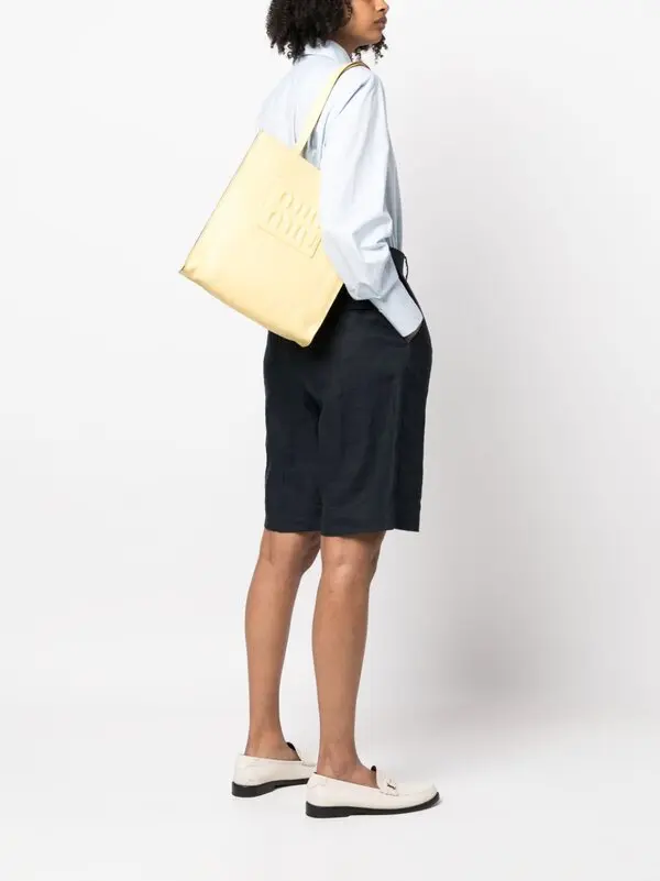 Miu Miu Logo-Embossed Tote Bag - Yellow | Editorialist