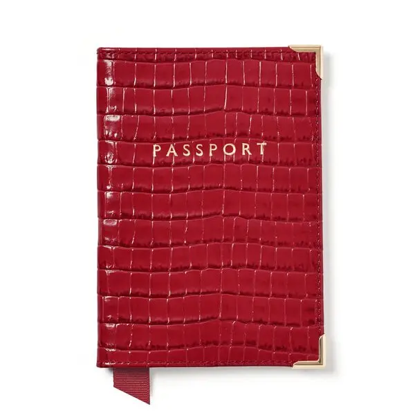 ASPINAL OF LONDON Passport Cover In Deep Shine Fig Small Croc - Red