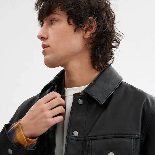 Coach Regenerative Leather Trucker Jacket In Black - 50% Off