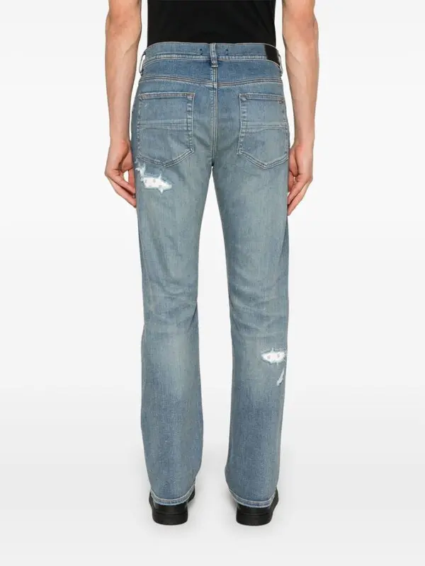 Amiri Repaired Jeans