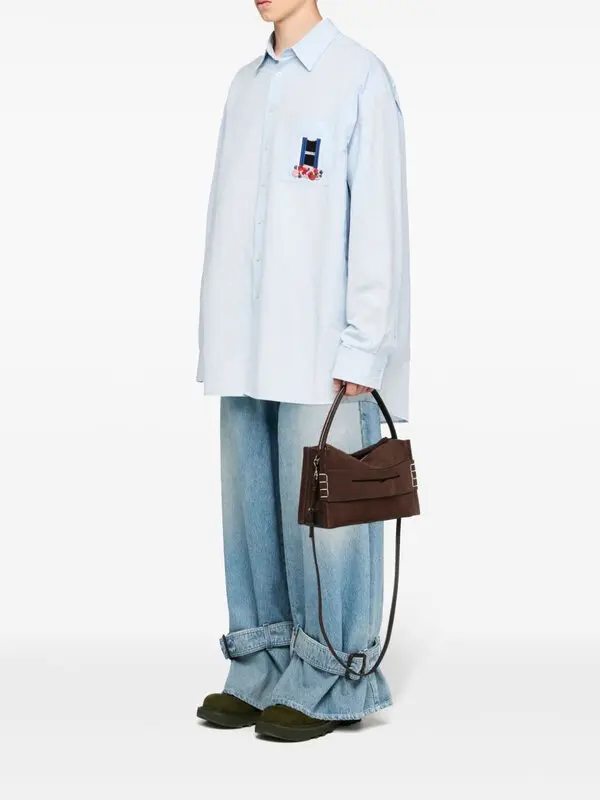 JW Anderson Buckled Cuff Wide Leg Jeans