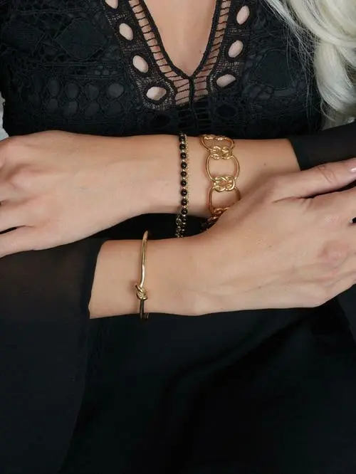 DLORIA Plated Love Knot Cuff Bracelet