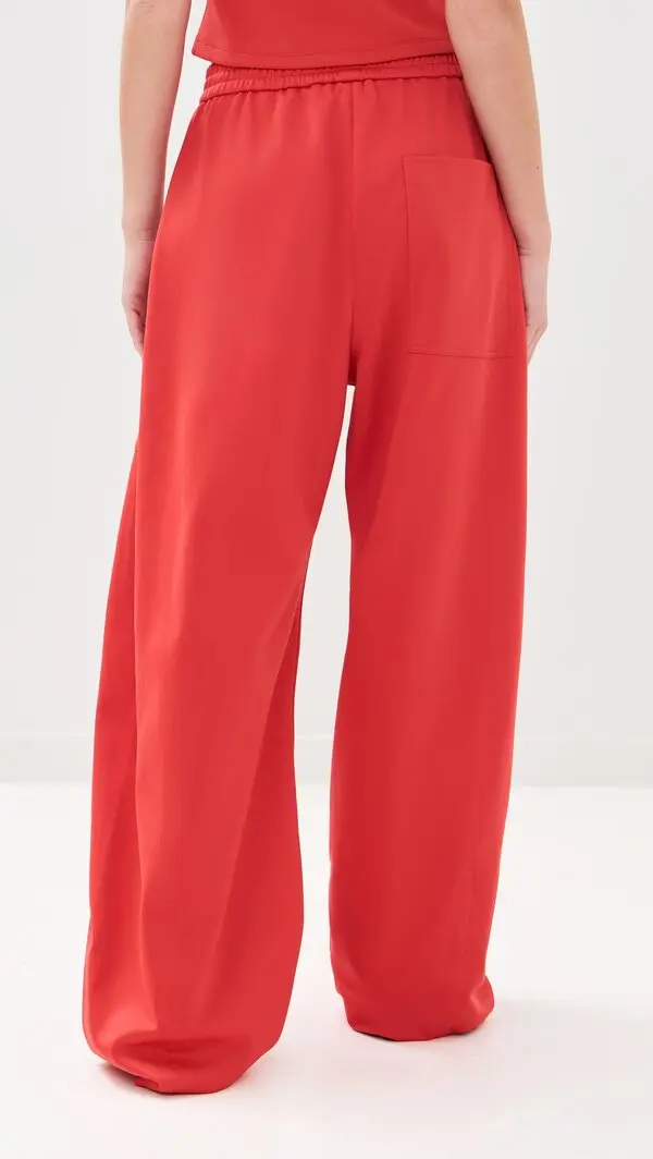 The Red Pants Trend is the Minimalist Hack to Add Color to Your Closet