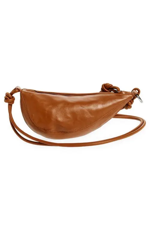 Dries Van Noten Bombe Leather Sling Bag In Tan - 60% Off