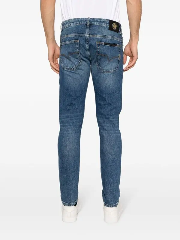 Versace Logo-appliqué Slim-cut Jeans