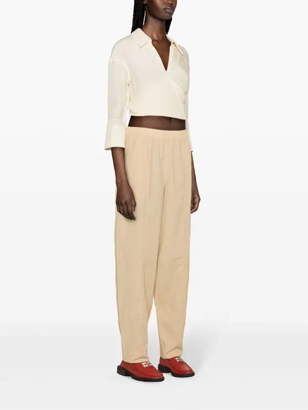 GANNI Curve Tapered-leg Trousers