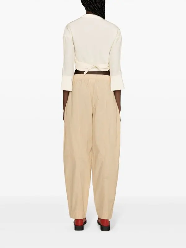 GANNI Curve Tapered-leg Trousers