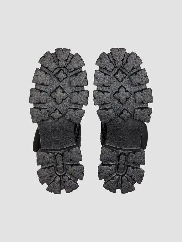 Prada Monolith Brushed Leather And Re-nylon Boots With Pouch