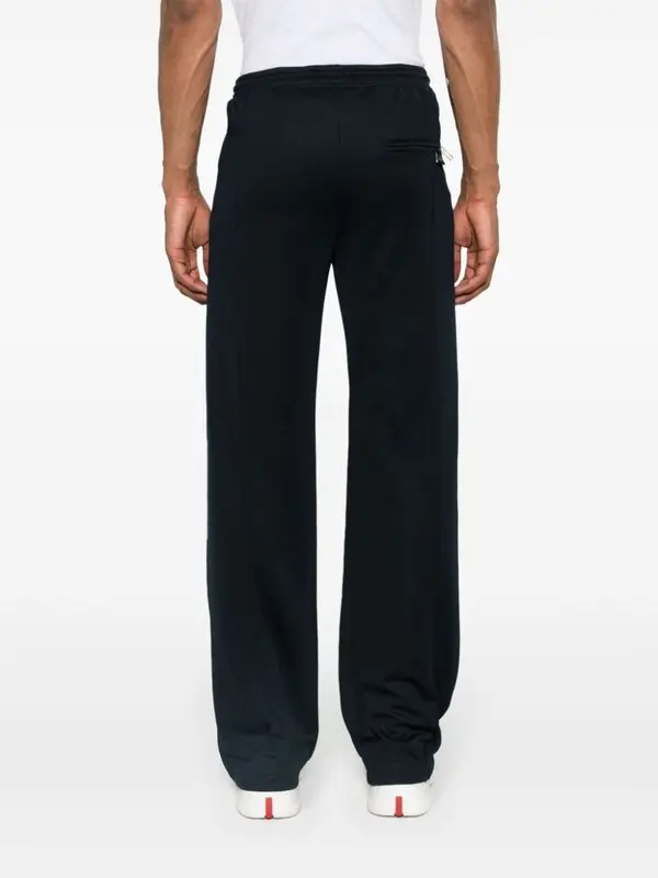 COURREGES Logo-patch Interlock Track Pants - Blue