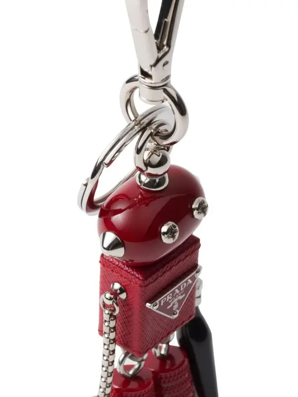 プラダ　ヒーローキャラクター キーホルダー Prada Triangle-Logo Robot Keychain - Red | Editorialist