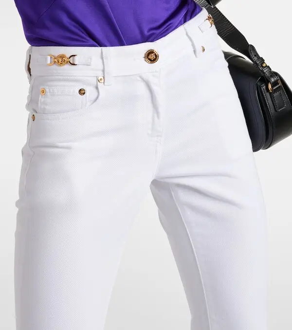 Versace Embellished Low-rise Flared Jeans