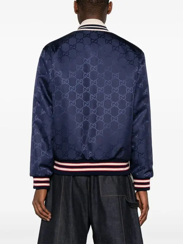Gucci Gg Supreme Reversible Bomber Jacket - Blue | Editorialist
