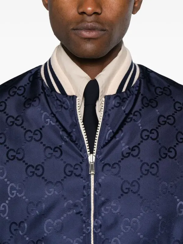 Gucci Gg Supreme Reversible Bomber Jacket - Blue | Editorialist