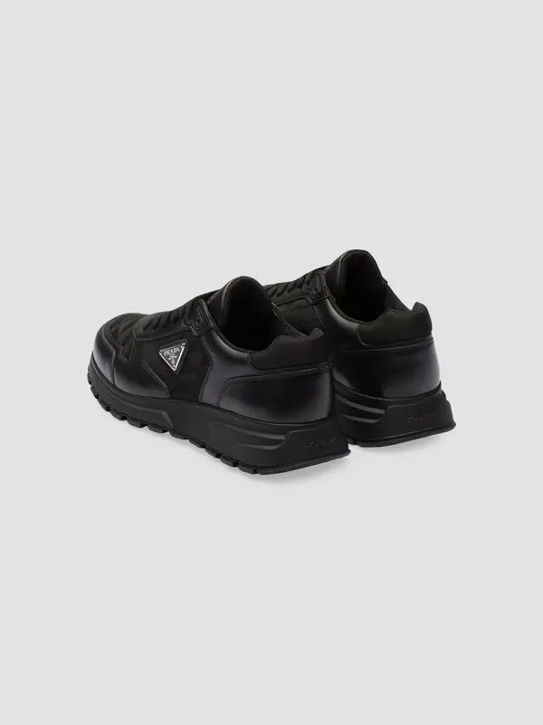Prada Leather And Re-nylon High-top Sneakers