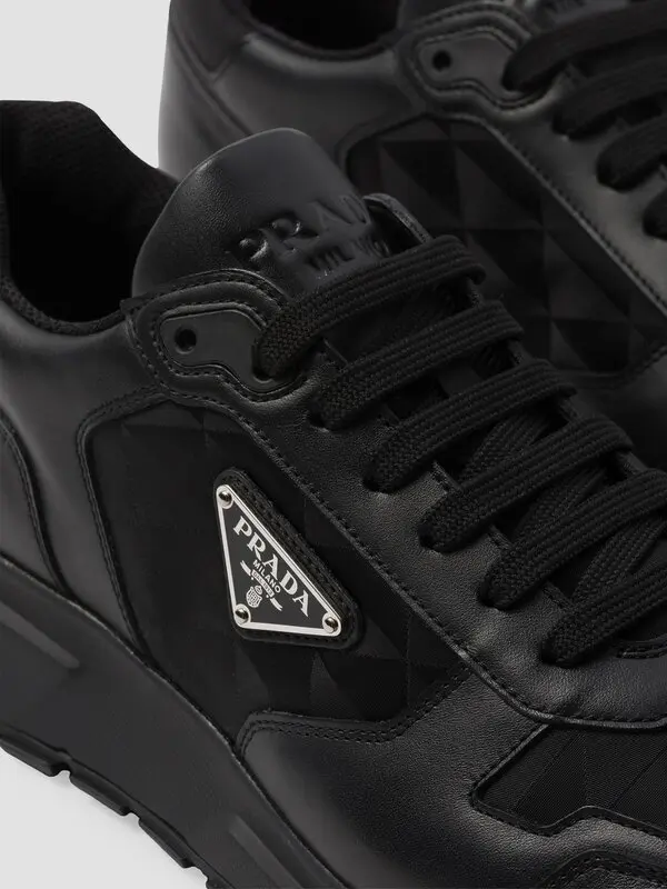 Prada Leather And Re-nylon High-top Sneakers