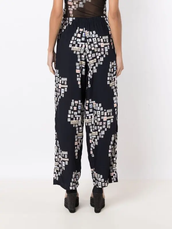 AMIR SLAMA Text-print Trousers