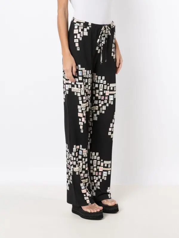 AMIR SLAMA Text-print Trousers