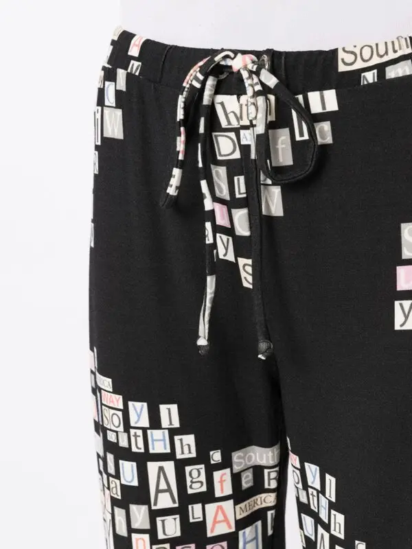 AMIR SLAMA Text-print Trousers