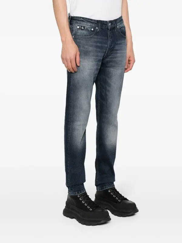 Calvin Klein Mid-rise Tapered-leg Jeans
