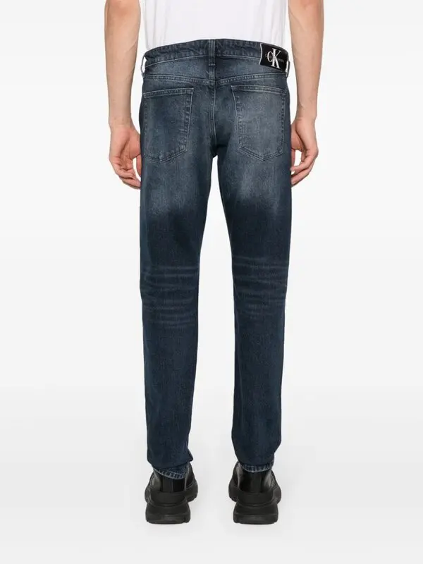Calvin Klein Mid-rise Tapered-leg Jeans