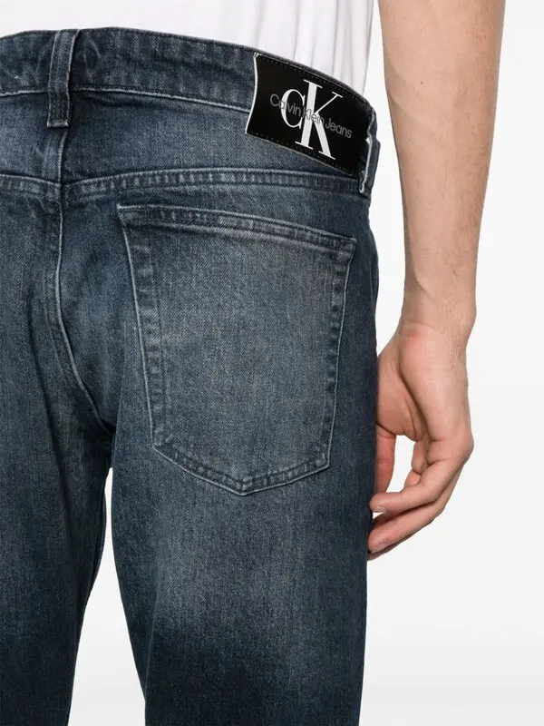 Calvin Klein Mid-rise Tapered-leg Jeans