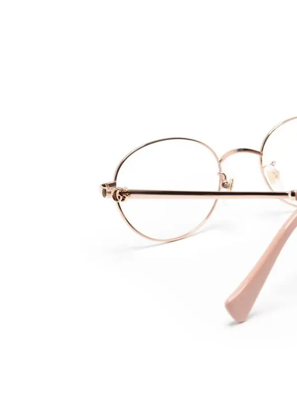 Gucci round sunglasses double GG frames shades Round-frame sunglasses in yellow gold-toned metal | GUCCI® US main image 4