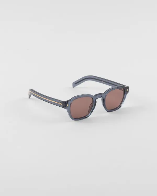 Prada Sunglasses With Iconic Metal Plaque
