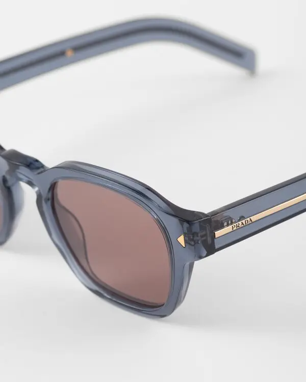 Prada Sunglasses With Iconic Metal Plaque