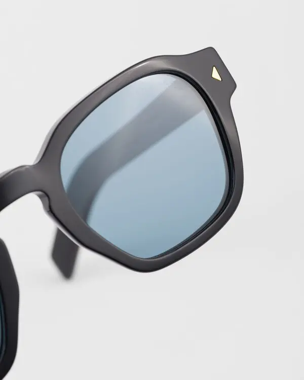 Prada Sunglasses With Metal Plaque