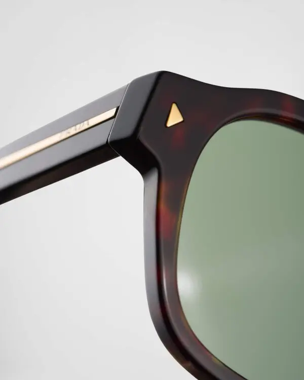 Prada Sunglasses With Metal Plaque