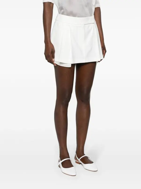 NISSA Low-rise Pleated Miniskirt