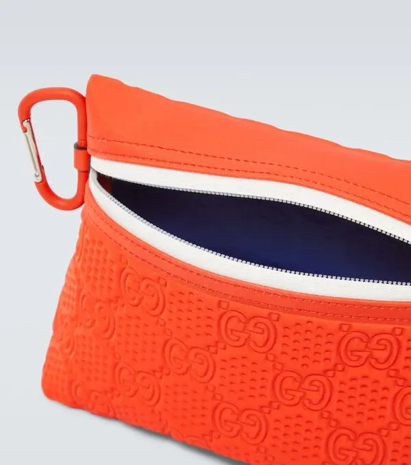 Gucci グッチ　GGパターン 小型ポーチ　オレンジ Gucci Small Gg Scuba Pouch - Orange | Editorialist