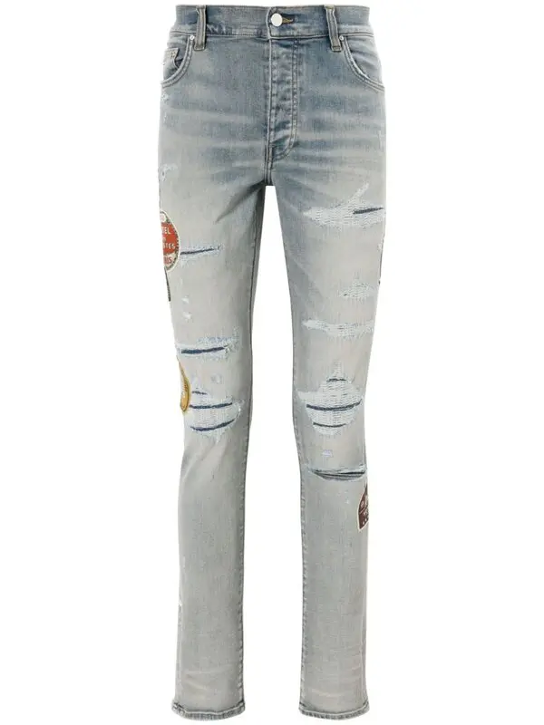 Amiri Travel Patch Repair Skinny Jeans - Blue