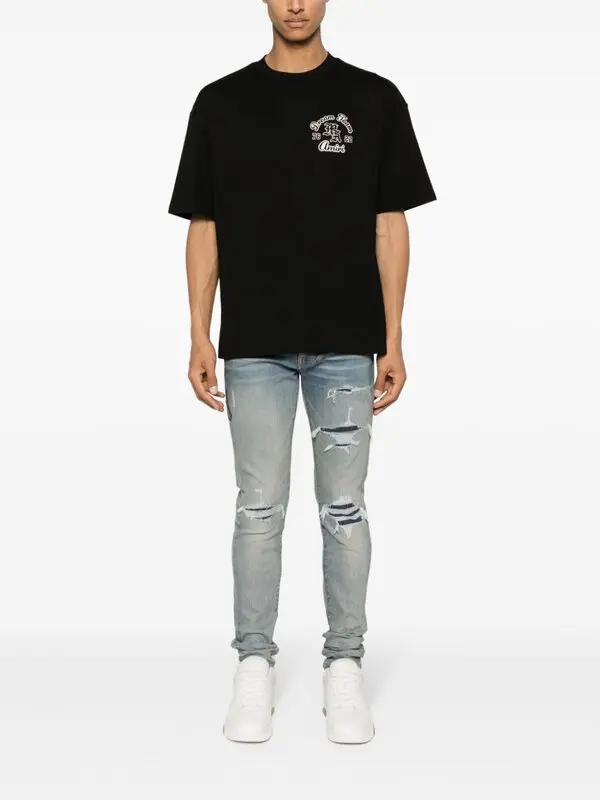 Amiri Distressed Skinny Jeans