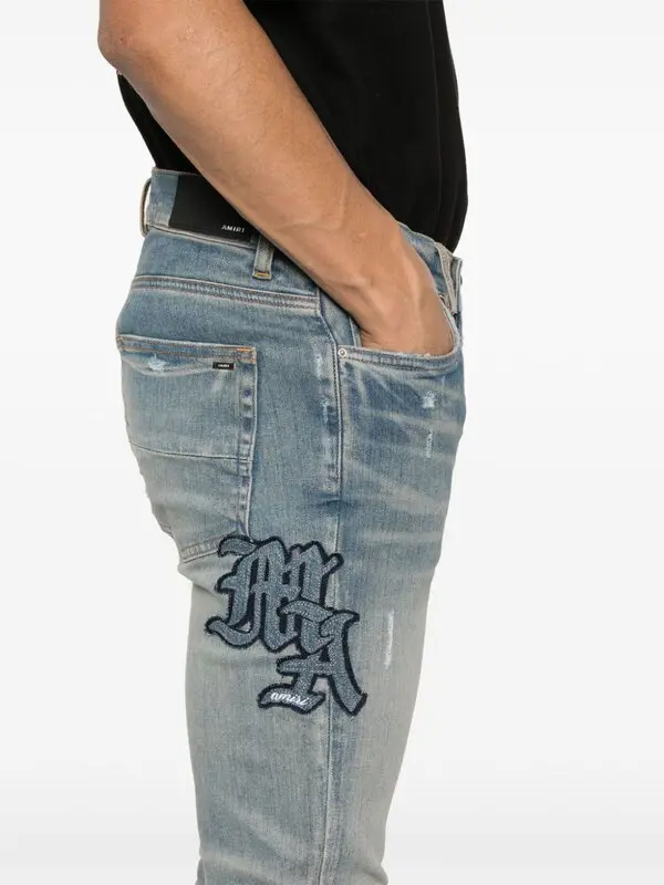 Amiri Distressed Skinny Jeans