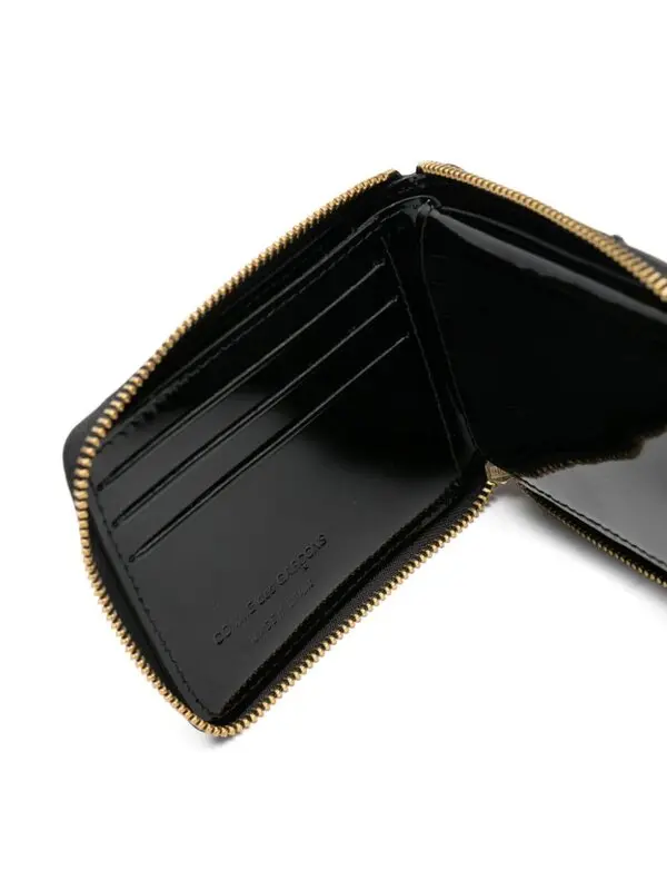Comme Des Garçons Reversed Hem Leather Wallet