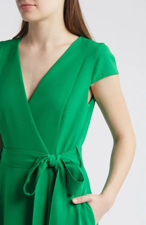 black halo midi dress in green Black Halo NEW Green Floral Midi Dress Asymmetrical Hem Size 2