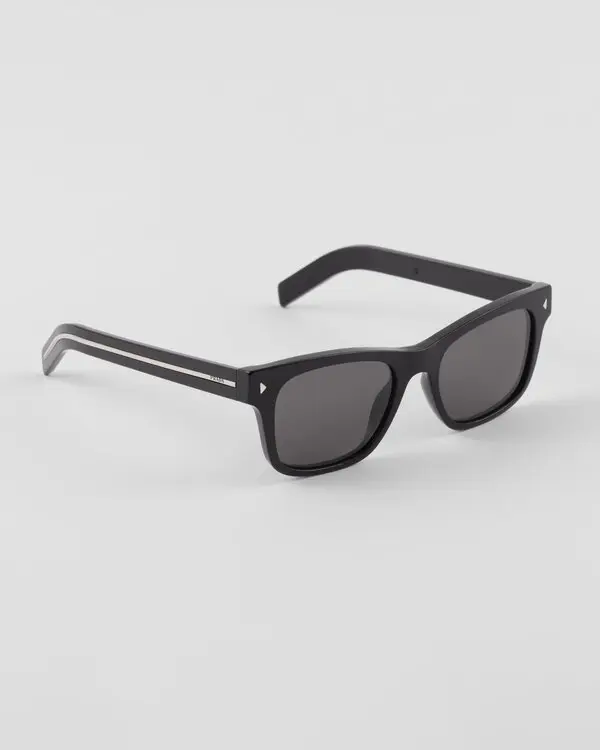 Prada Sunglasses With Iconic Metal Plaque