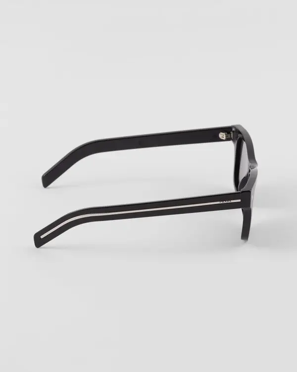 Prada Sunglasses With Iconic Metal Plaque