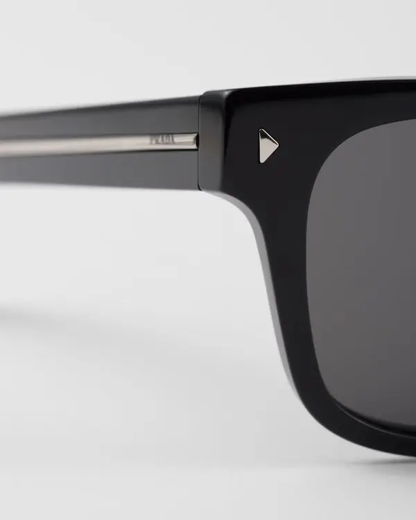 Prada Sunglasses With Iconic Metal Plaque