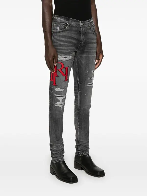 Amiri Distressed Skinny Jeans