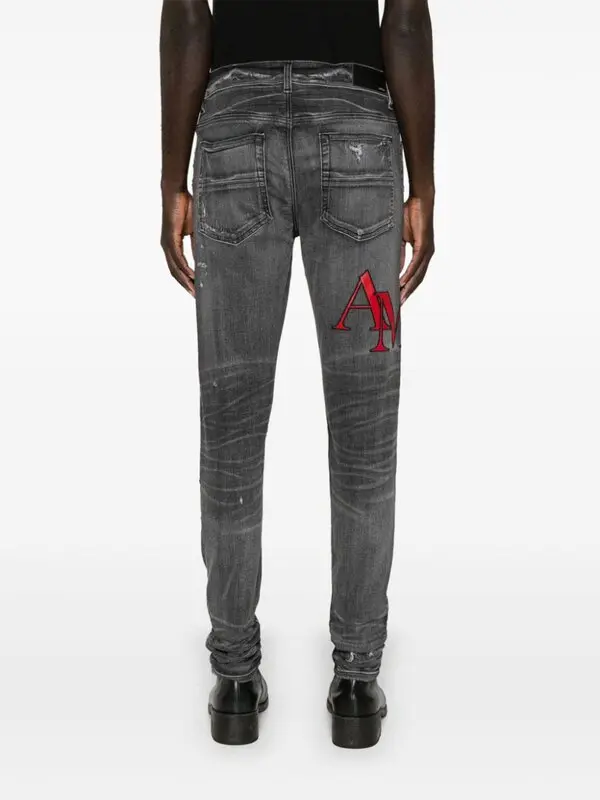Amiri Distressed Skinny Jeans