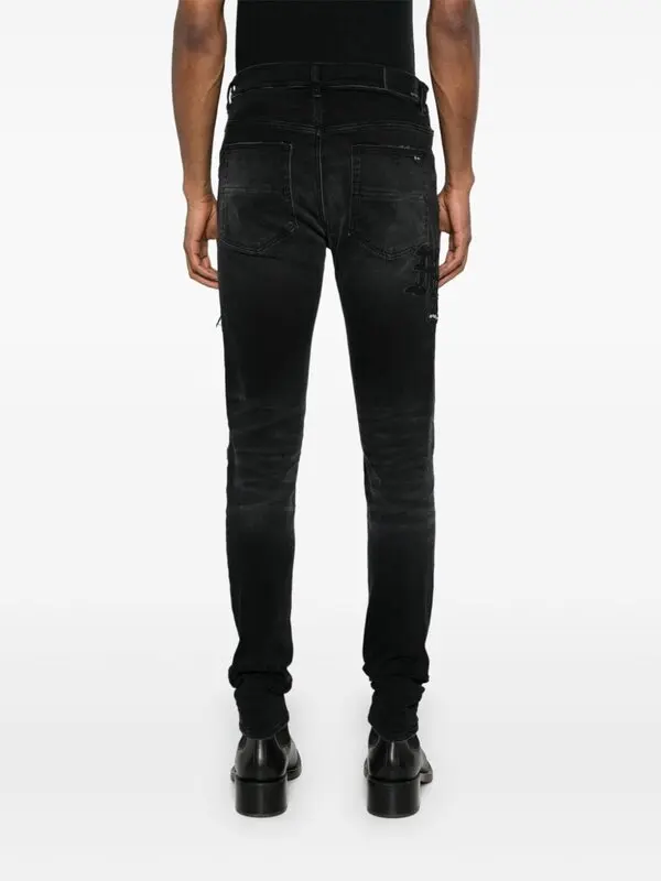 Amiri Distressed Skinny Jeans