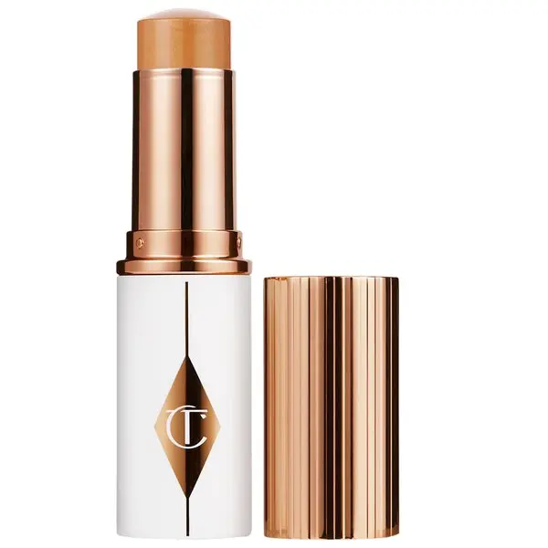 Charlotte Tilbury Unreal Skin Sheer Glow Tint Hydrating Foundation Stick - 9 Tan