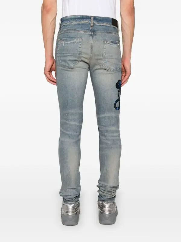Amiri Patch-detail Jeans