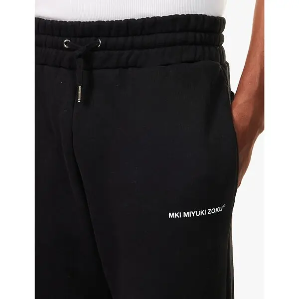 MKI MIYUKI ZOKU Brand-print Cotton-blend Jogging Bottoms - Black
